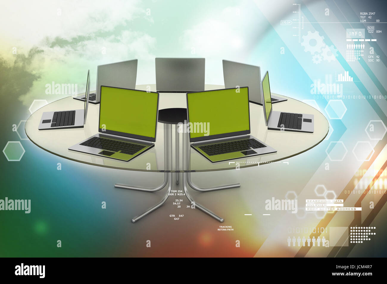 Laptop around the table Stock Photo - Alamy