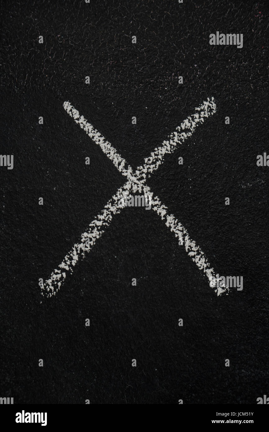 Letter X drawn with white chalk on blackboard. Education, school ...