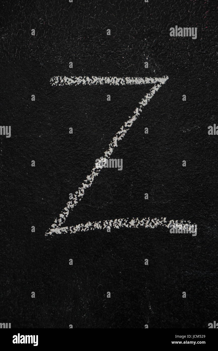 Letter Z drawn with white chalk on blackboard. Education, school ...