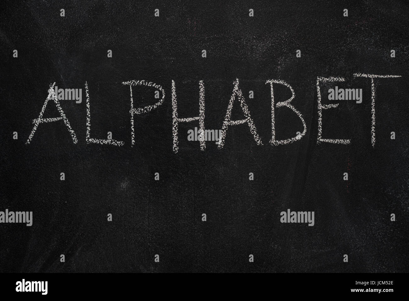Alphabet word written with white chalk on blackboard. Education, school ...