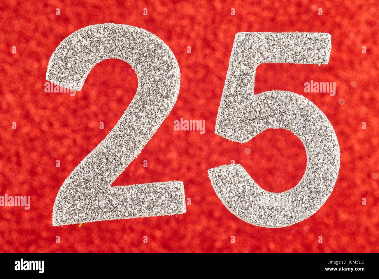 Number twenty-five silver color over a red background. Anniversary ...