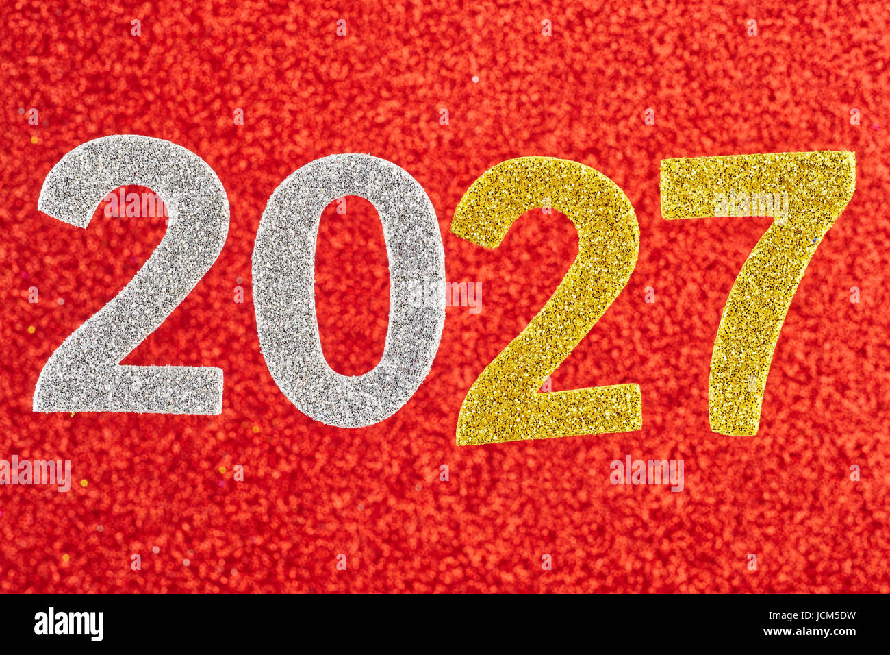 Number two thousand and twenty-seven over a red background. Anniversary ...