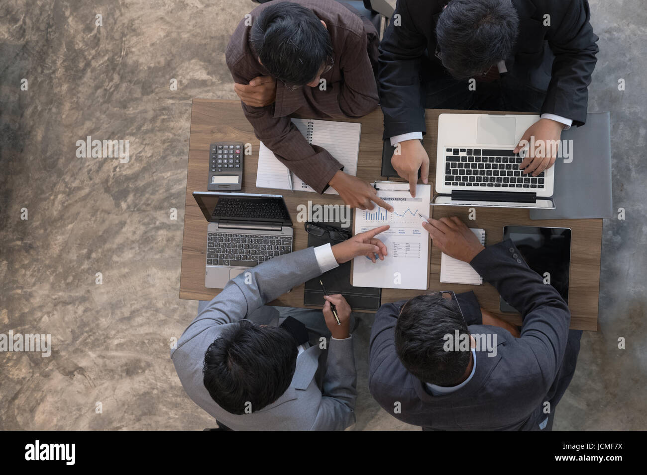 young business people and entrepreneur having a meeting around table in ...