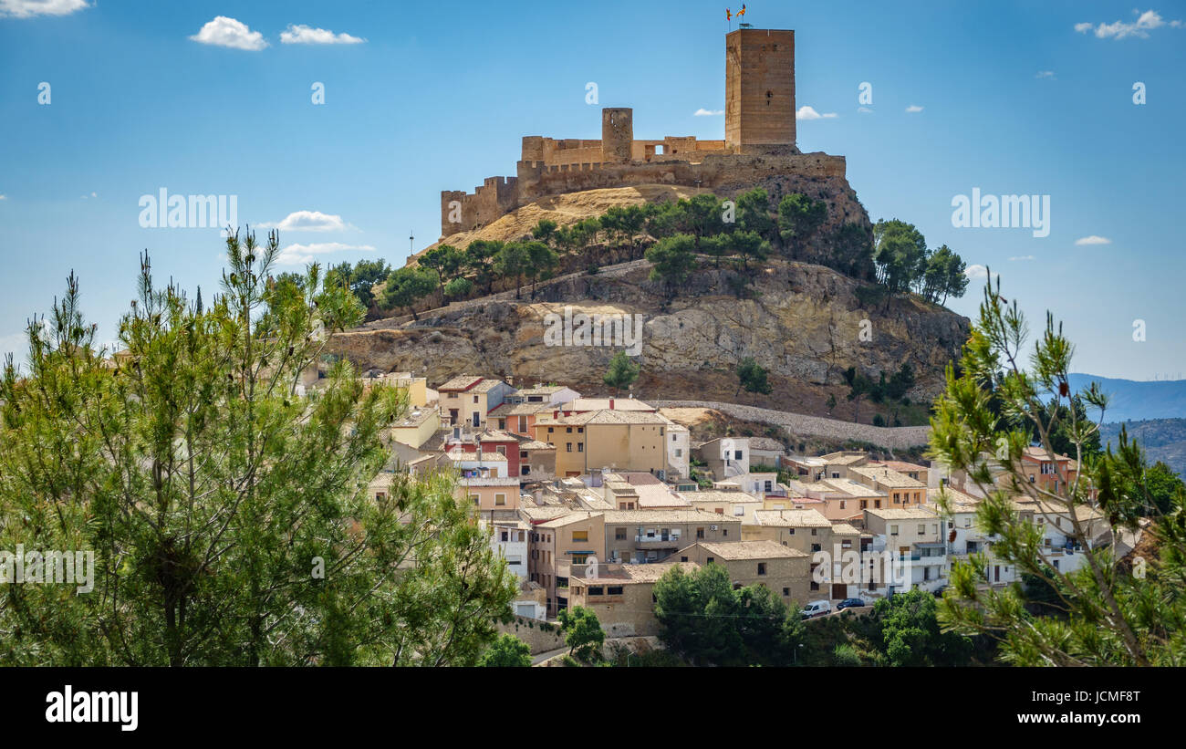 Top of the hill with Biar castle and town at dusk in Alicante, Spain ...
