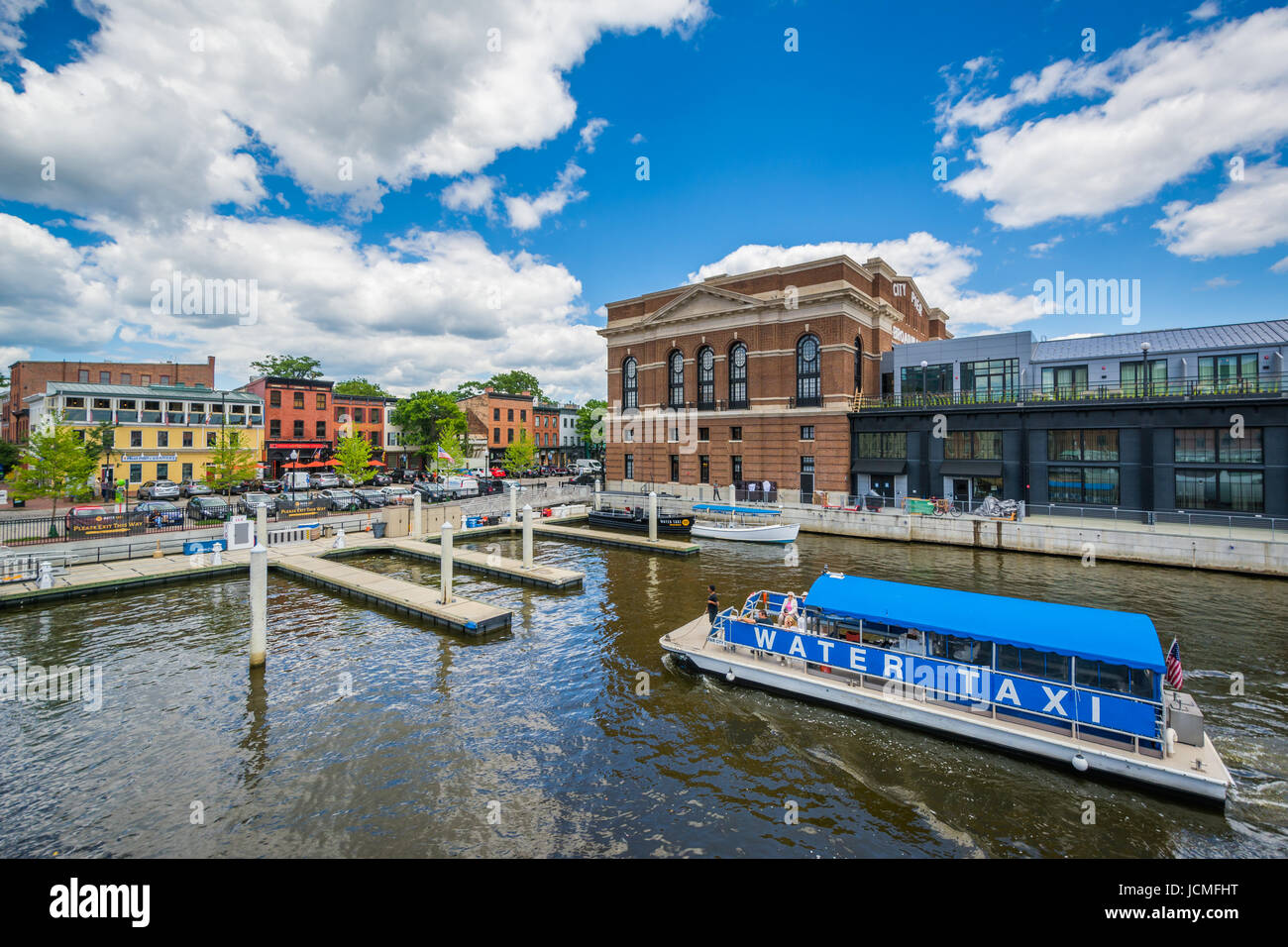 View of a water taxi at the Fells Point Waterfront, in Baltimore ...