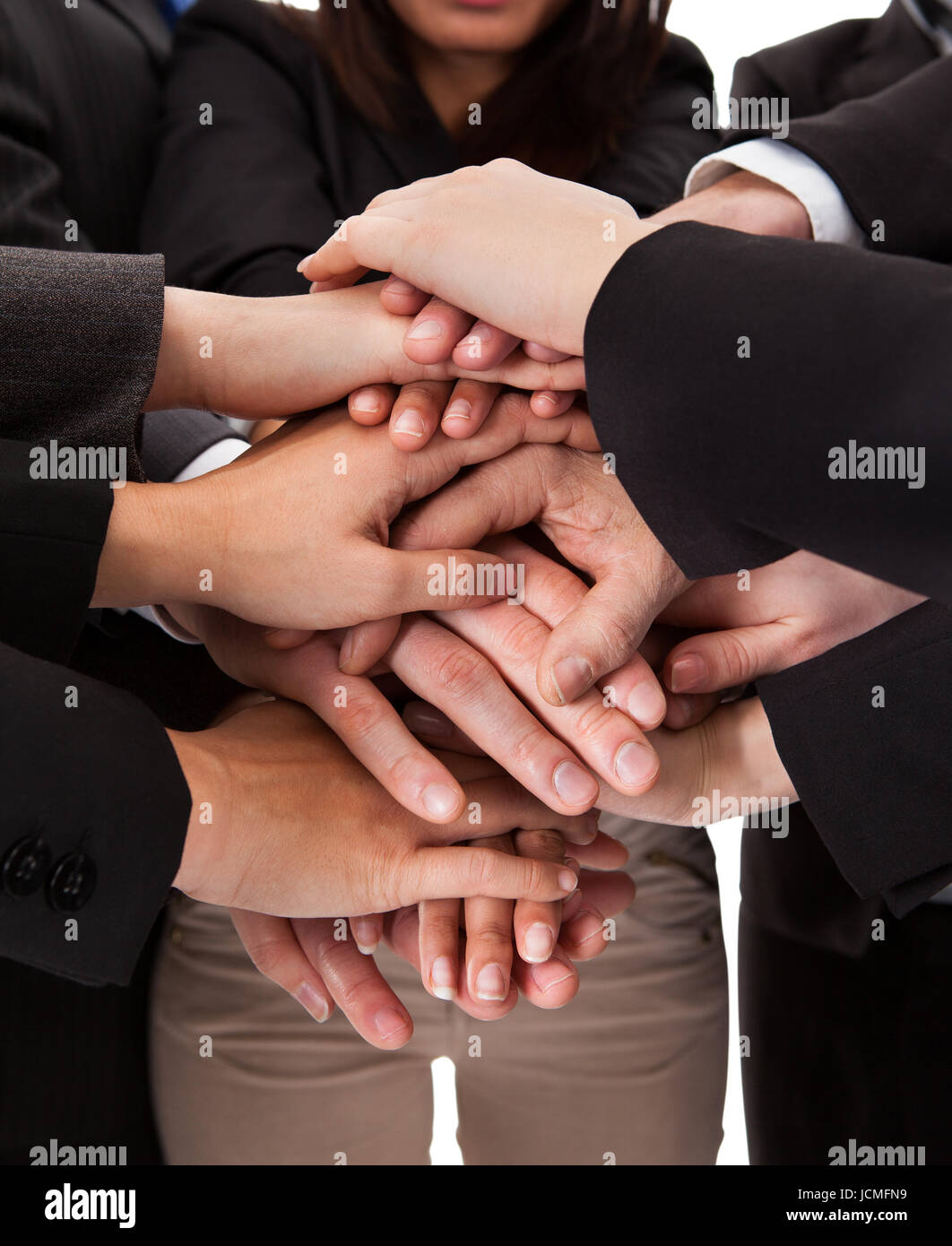 Close-up photo of business people hands stack Stock Photo - Alamy