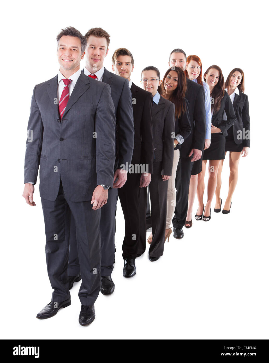 Business people standing in row over white background Stock Photo - Alamy
