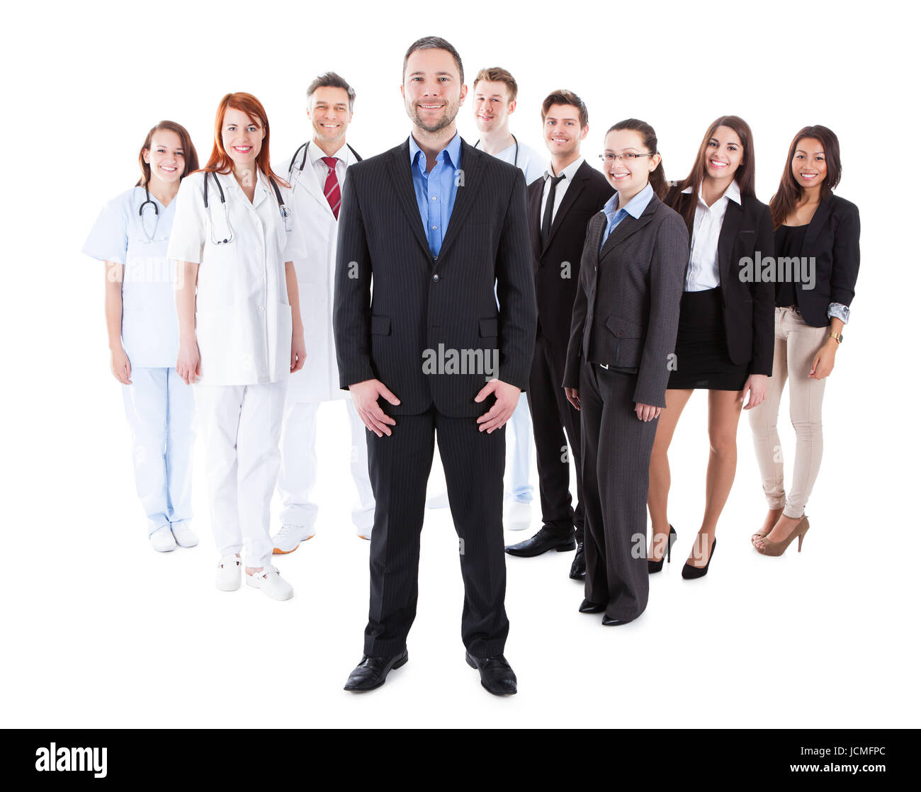 Boss standing on front of his team of doctors and managers Stock Photo ...