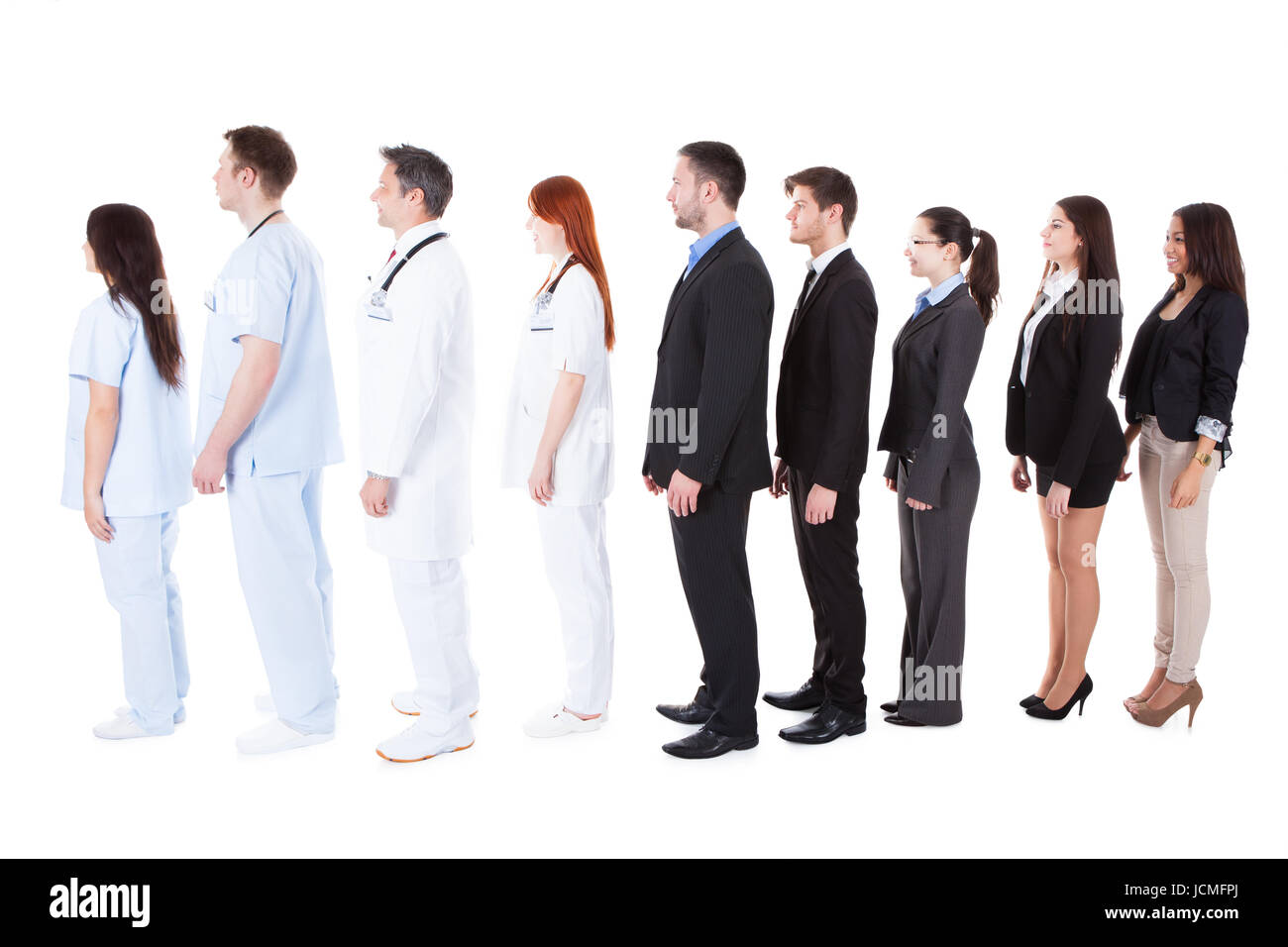 Doctors and managers standing in queue. Isolated on white Stock Photo ...