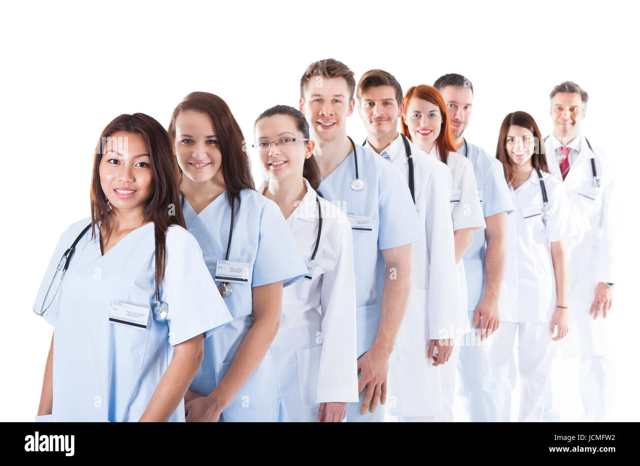 Long receding line or queue of smiling doctors and nurses in white ...