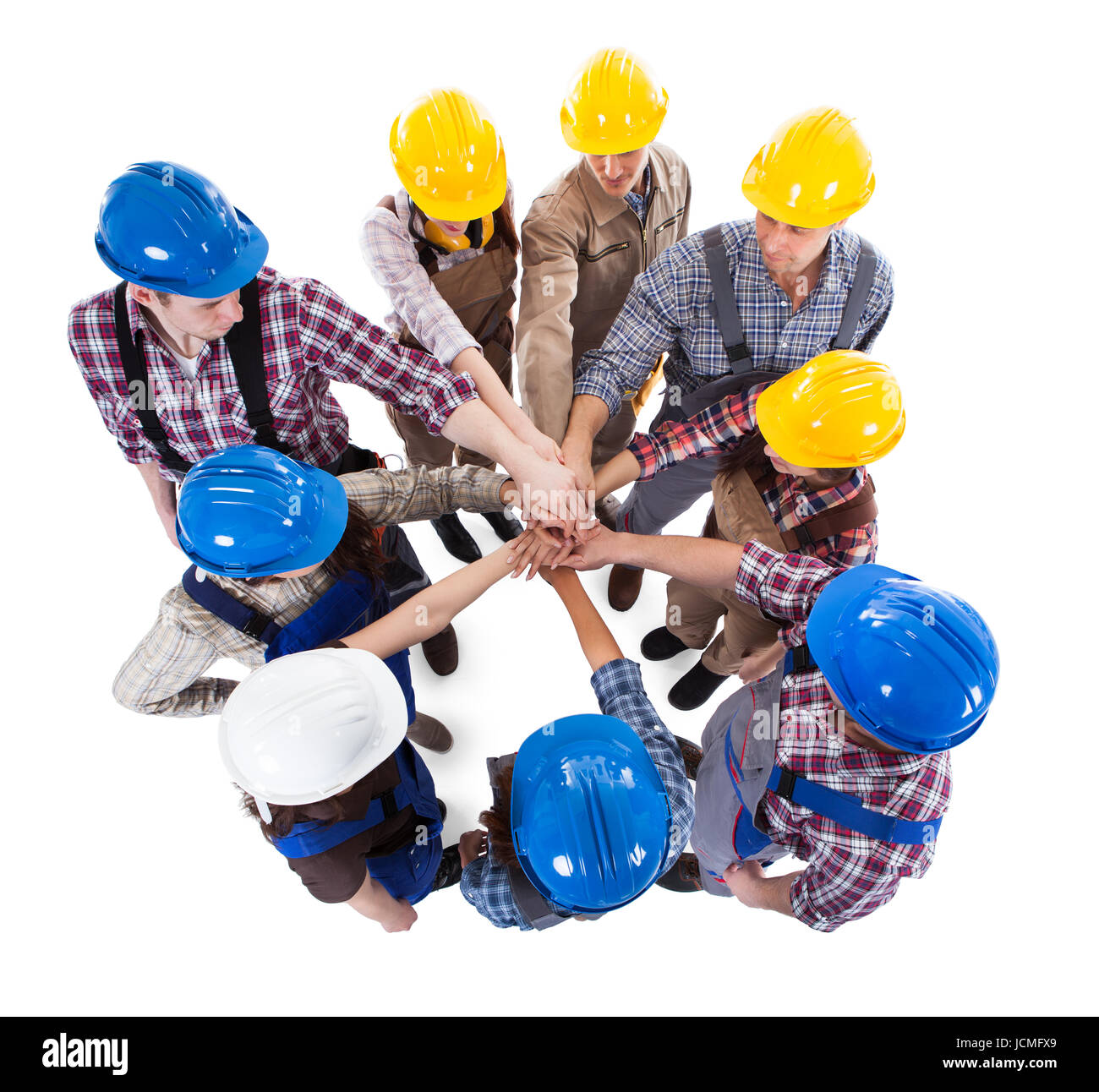 Large group of construction worker stacking hands. Isolated on white ...
