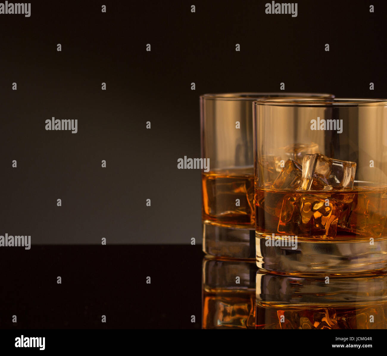 Whiskey on the rocks Stock Photo - Alamy