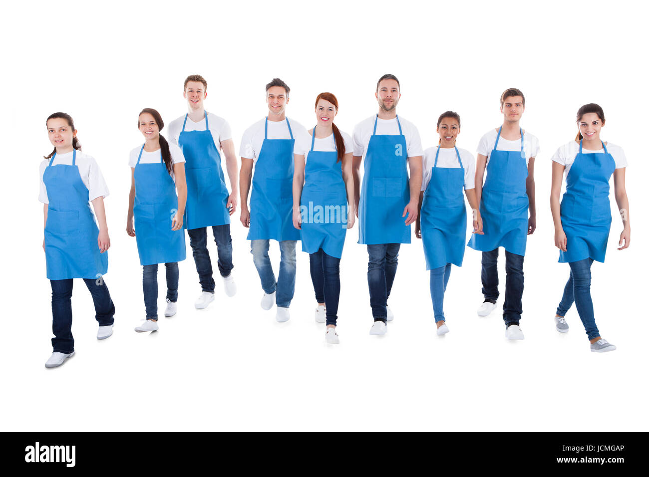 Professional cleaners walking towards camera. Isolated on white Stock ...