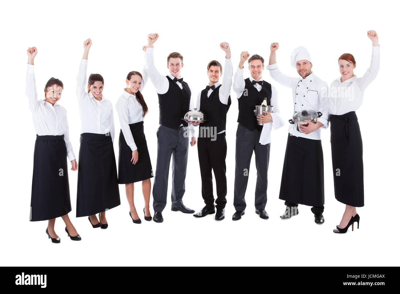 Large group of waiters and waitresses cheering. Isolated on white Stock ...