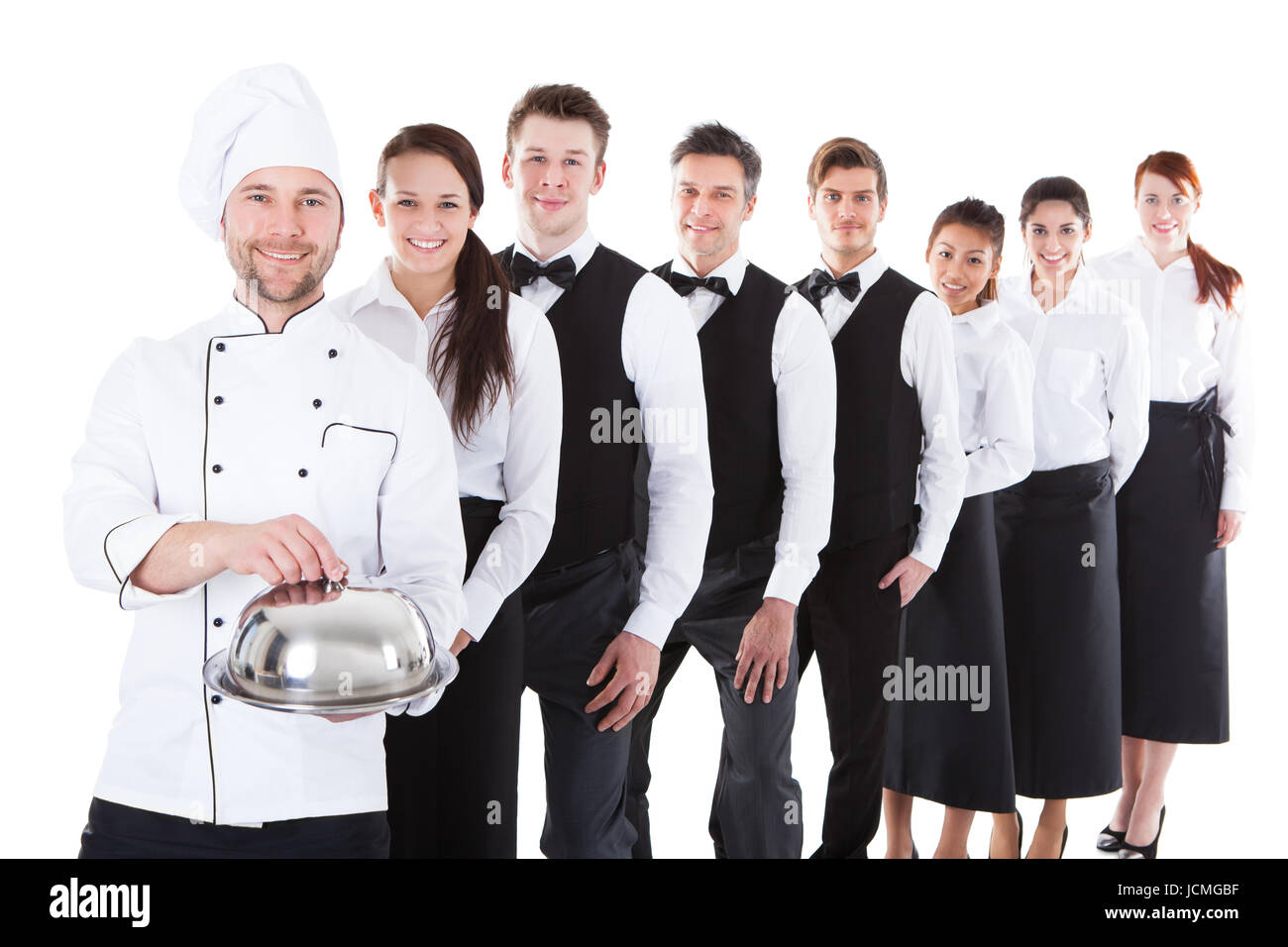 Large group of waiters and waitresses standing in row. Isolated on ...