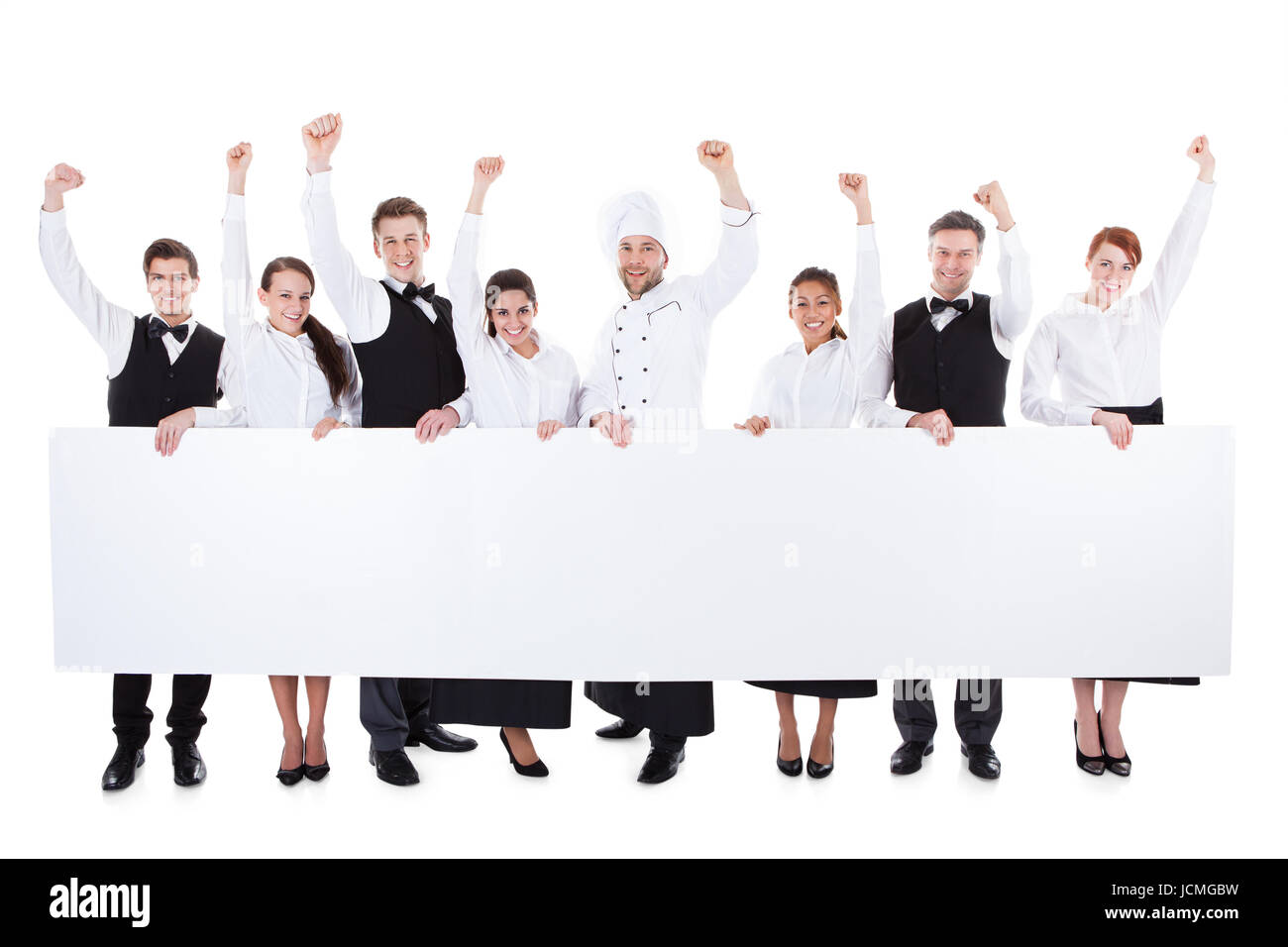 Cheerful excited catering staff showing banner. Isolated on white Stock ...