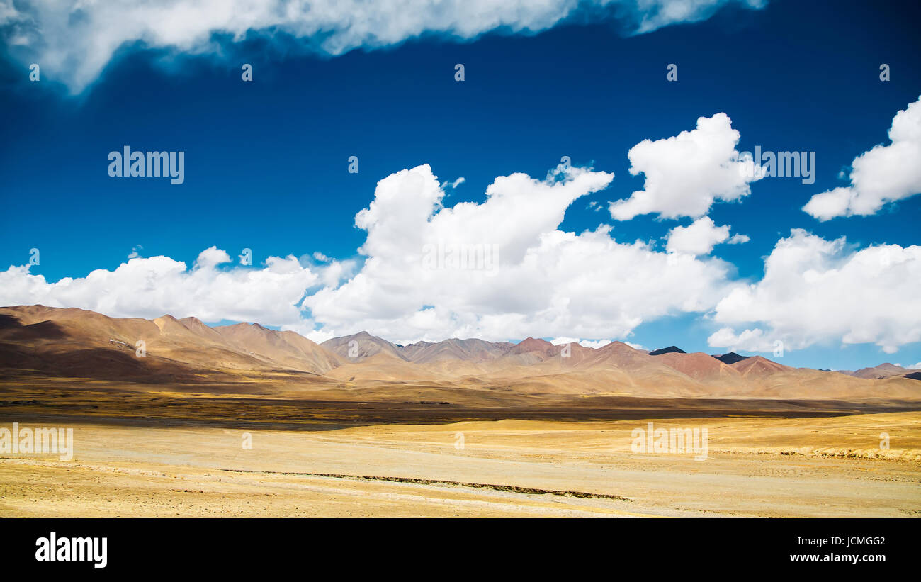 Beautiful scenery in Tibet with great mountain against blue and white ...