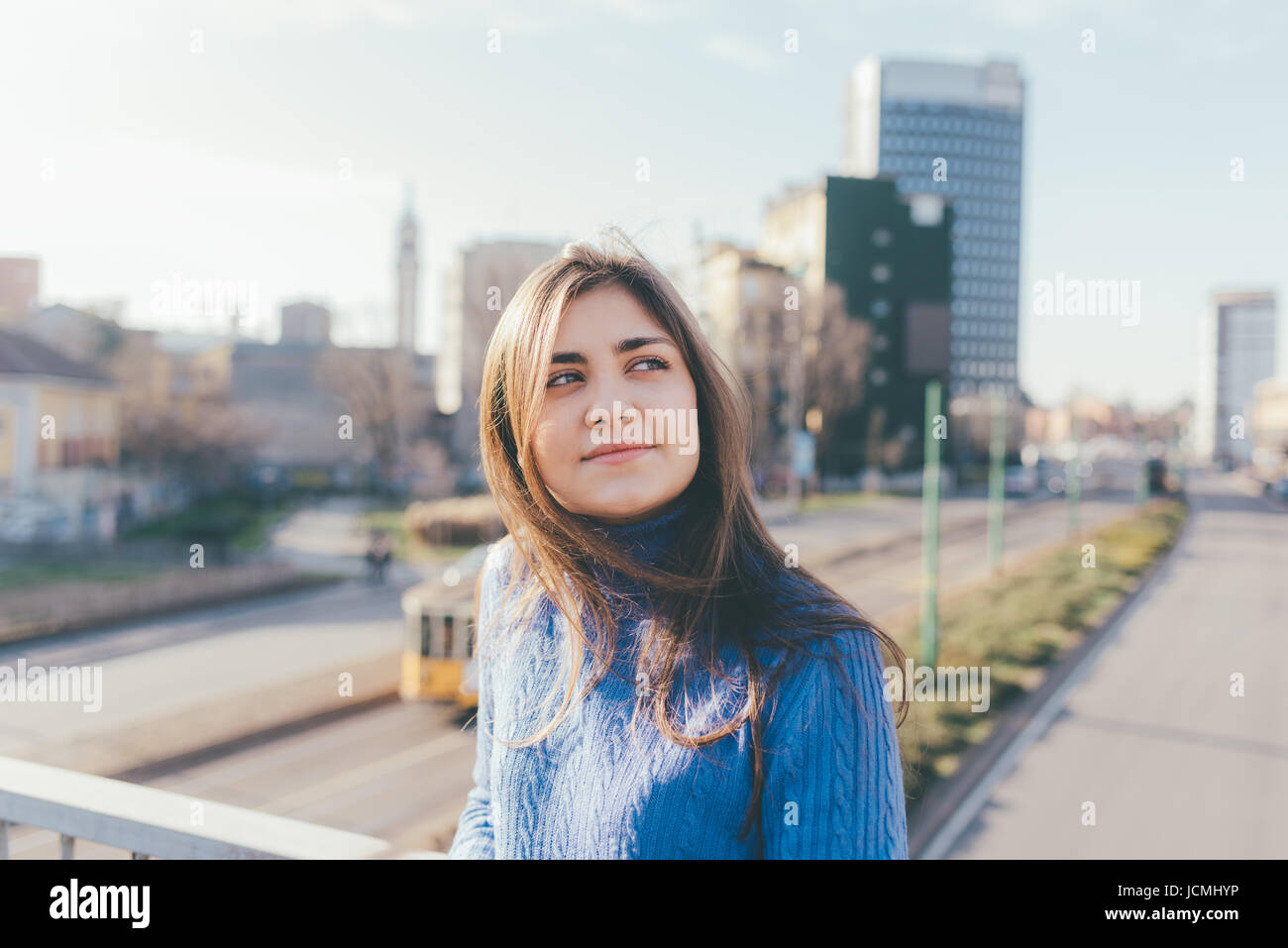 Portrait Young Woman Outdoor Back Light Looking Away Smiling