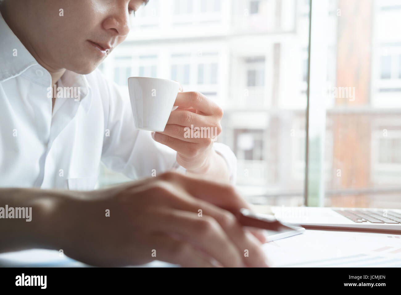 young male graphic designer working with computer. creative man using ...