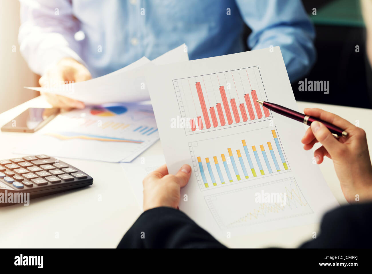 Business colleagues stock reports hi-res stock photography and images - Alamy