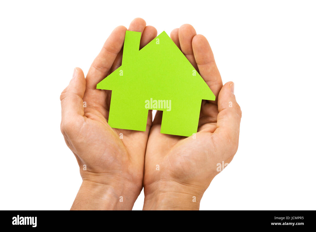 hands holding green house isolated on white background Stock Photo - Alamy