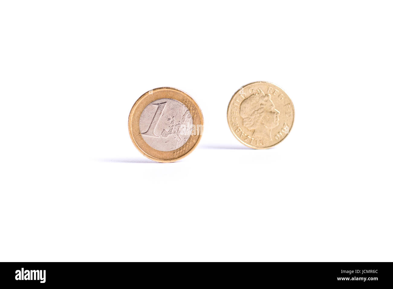British Pound coins and Euro coins isolated on white background Stock ...