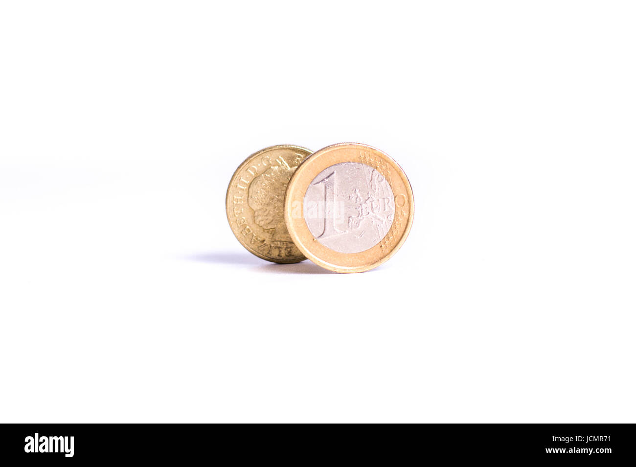 British Pound coins and Euro coins isolated on white background Stock ...