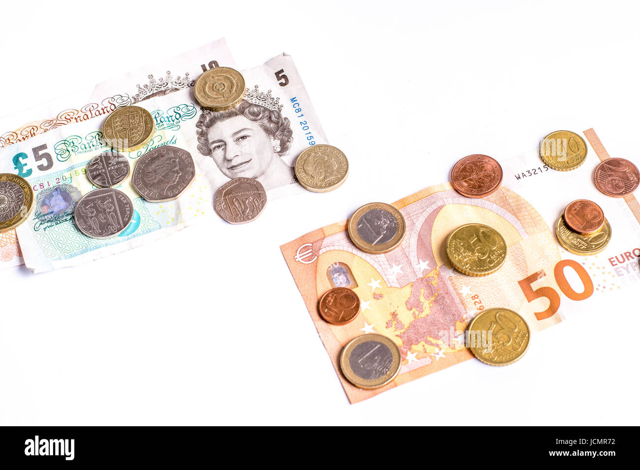 British Pound notes and coins and Euro notes and coins isolated on ...