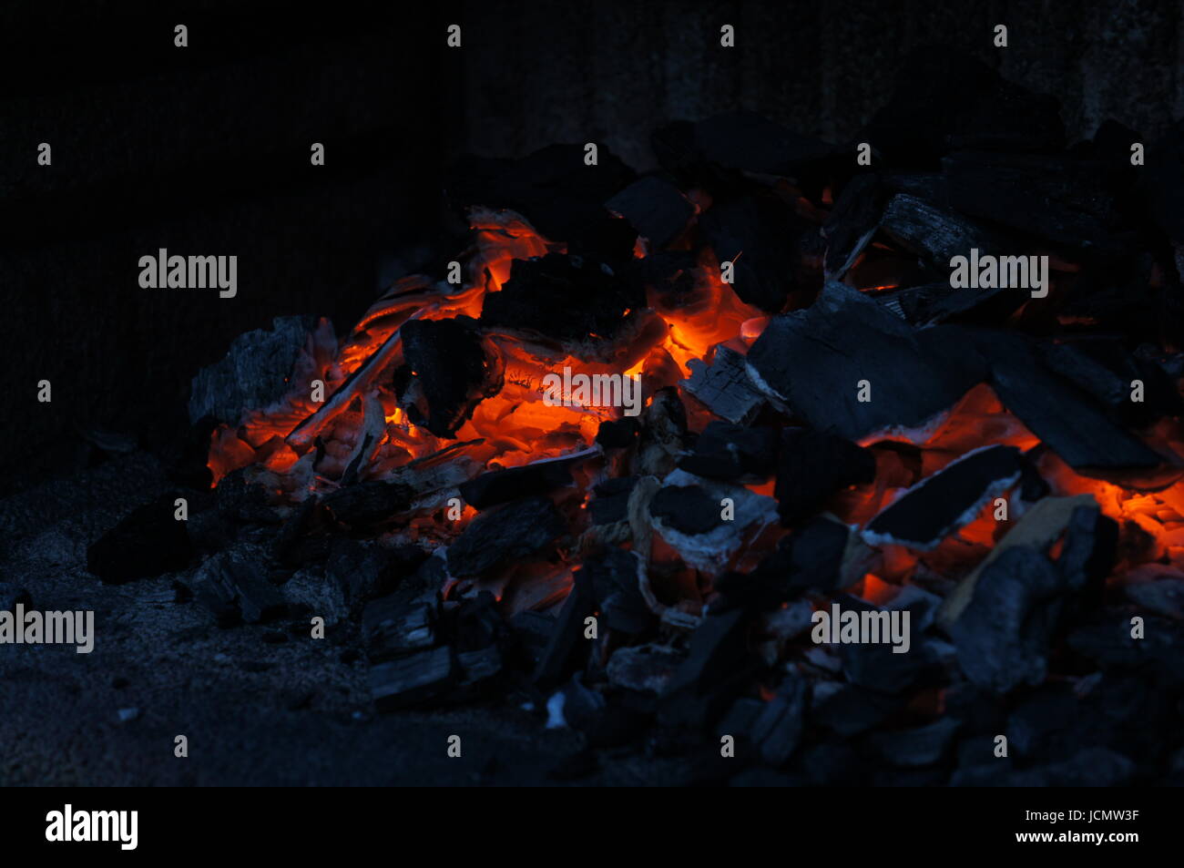 Burning embers in a open fire Stock Photo - Alamy