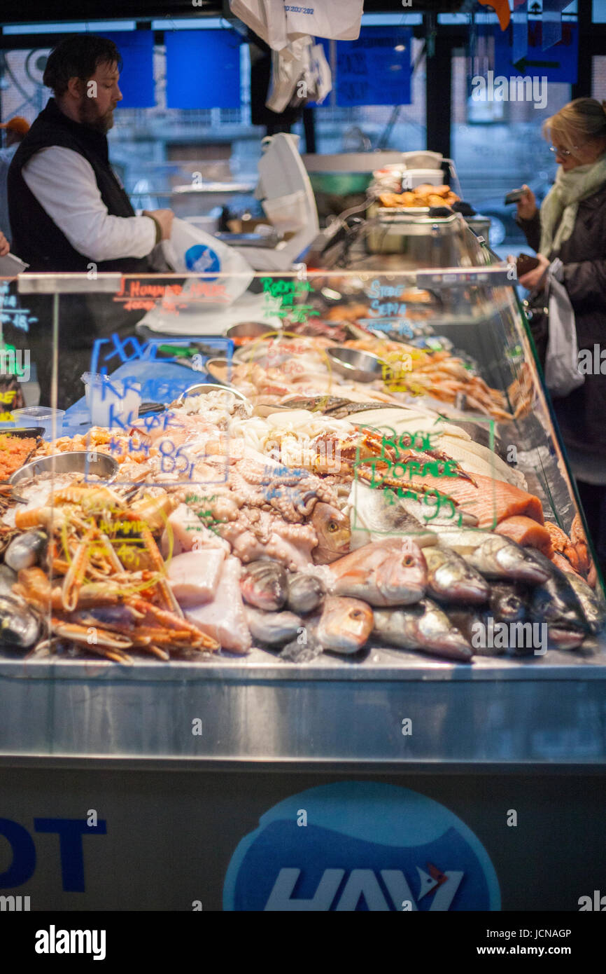 Fish monger at food market. Copenhagen Stock Photo - Alamy