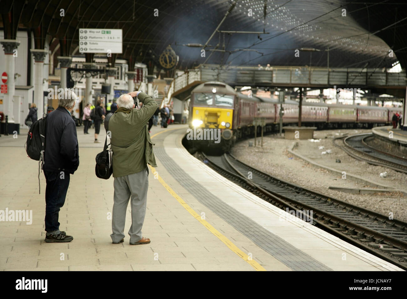 Rail enthusiasts photographing a West Coast Railways class 57 diesel ...