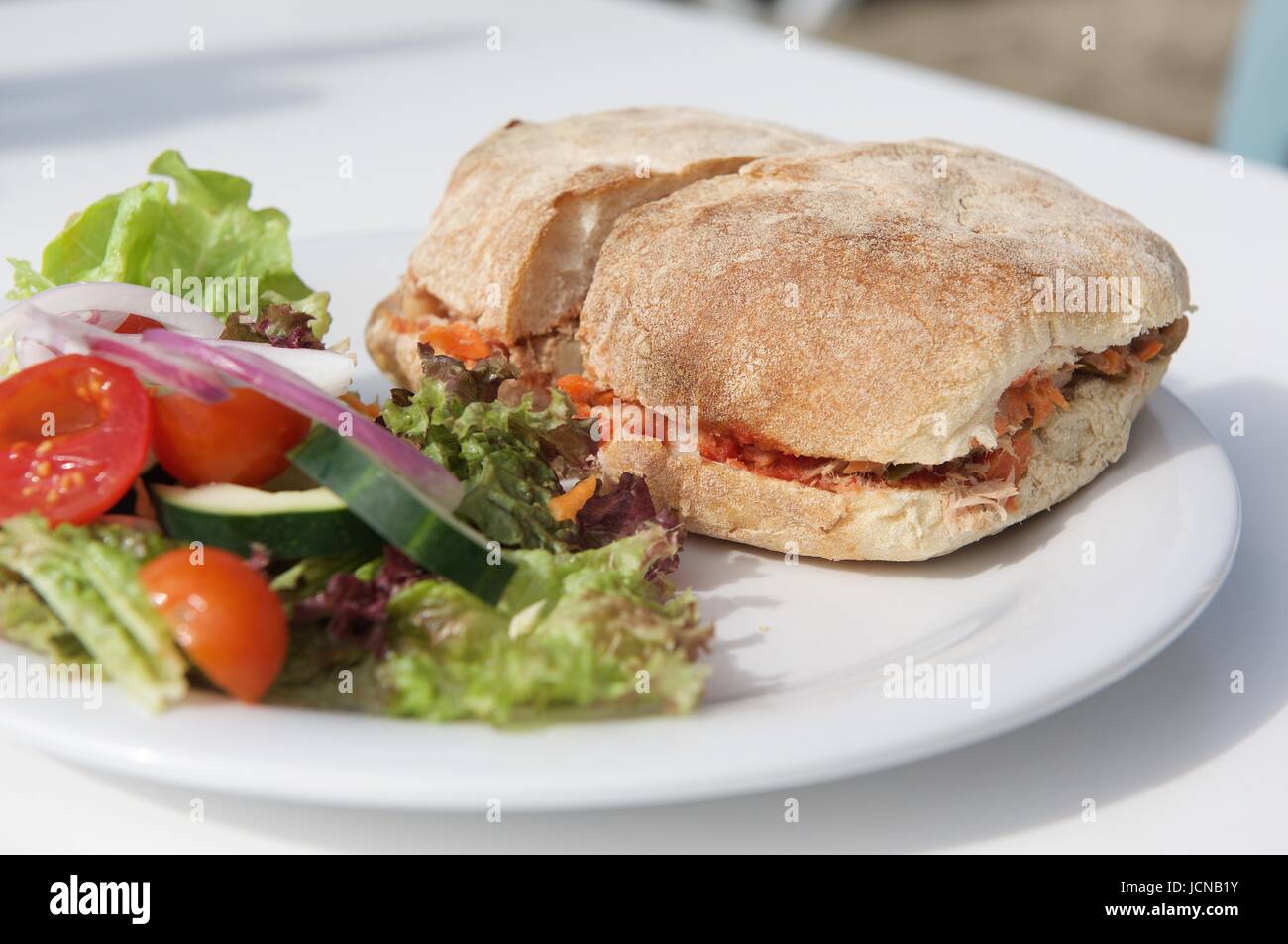Maltese snack ftira isolated in white background served with fresh ...