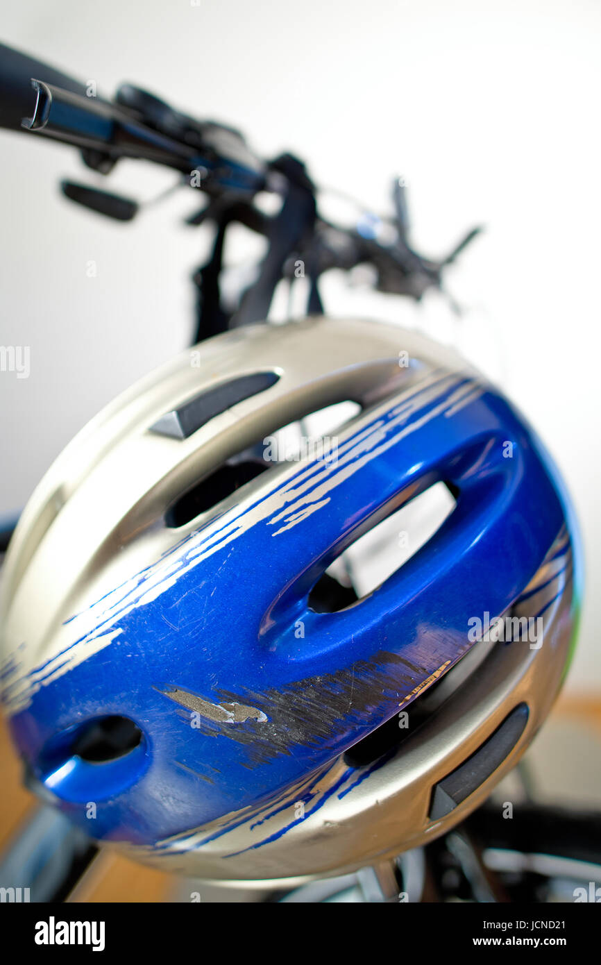 Old Scraped Safety Helmet On The Bike Stock Photo - Alamy