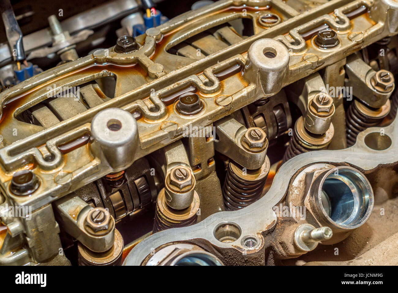Valve train system of engine head during its maintaining Stock Photo ...