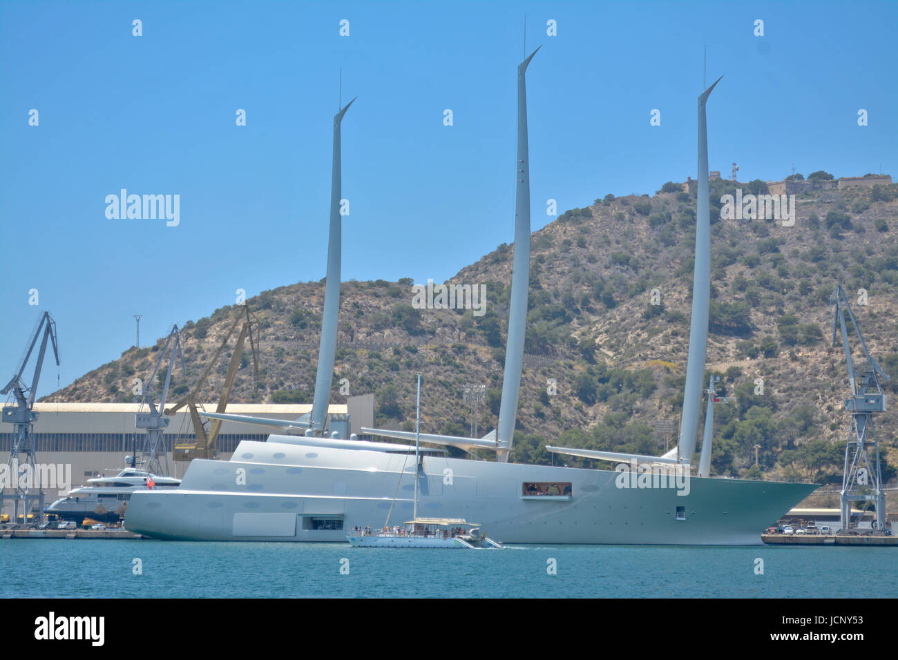 Yacht sails in harbour past hi-res stock photography and images - Alamy
