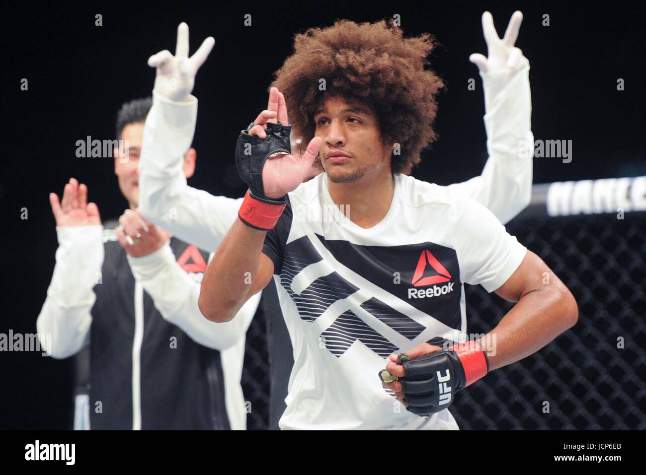 Singapore. 17th June, 2017. United States' Alex Caceres celebrates ...