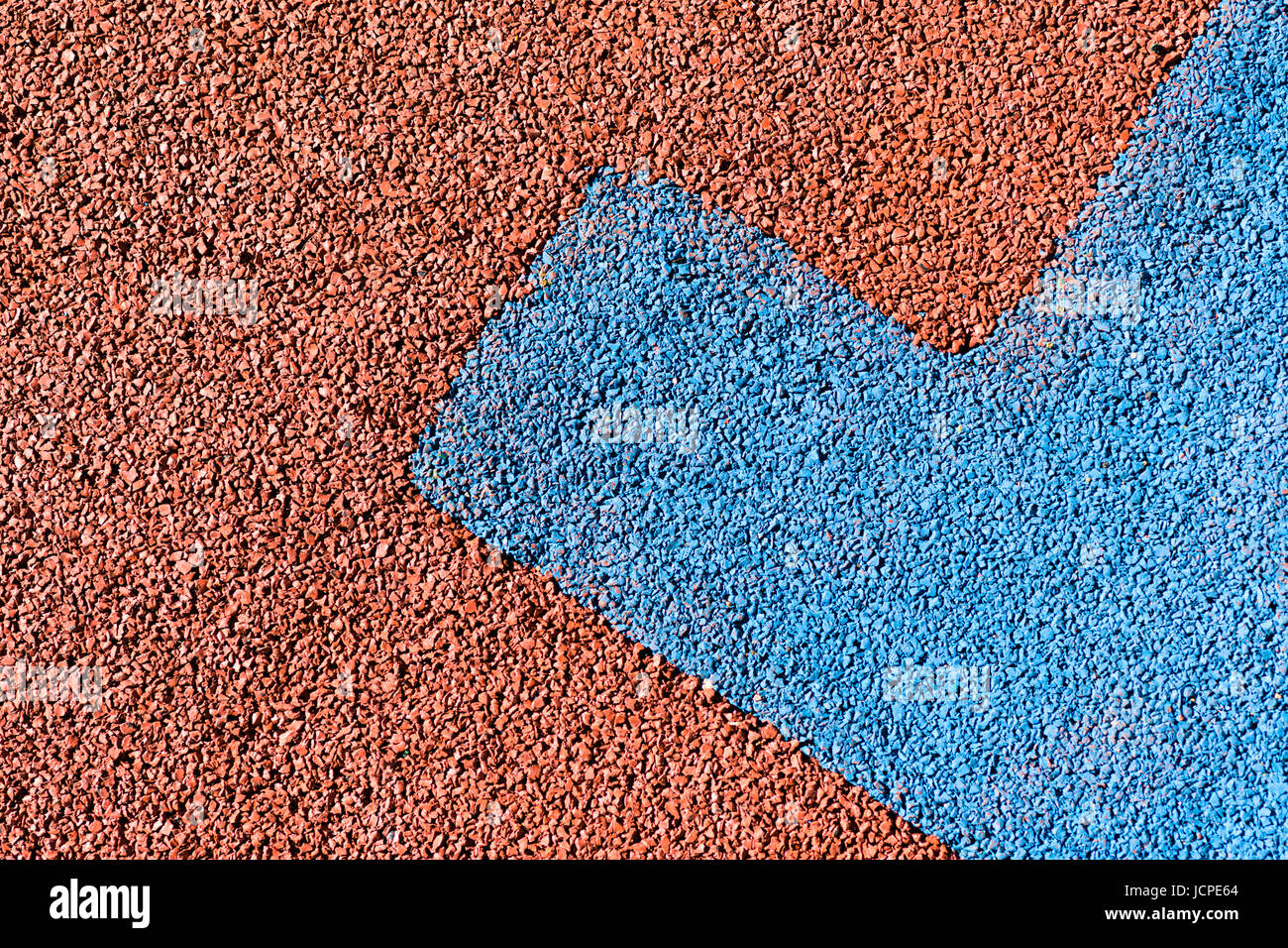 Rubber colored safety coating of sports playground closeup background ...