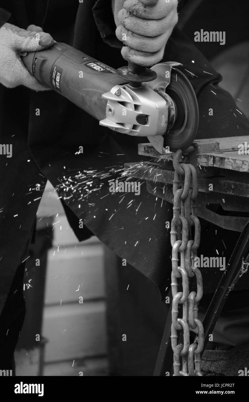 DIY with an Angle Grinder, Cutting a Big Padlock. Close Up Manual ...