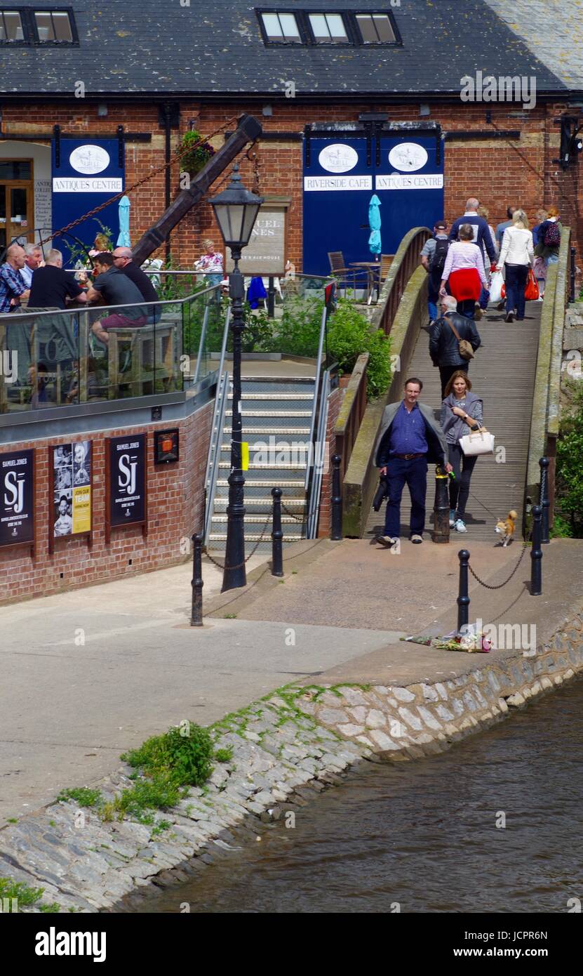People Walking across the Wooden Bridge at Exeter Quay, Near the ...