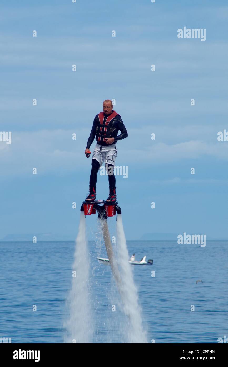 A Flyboarding Man at Oddicombe Beach, Torquay. Devon, UK. July, 2016 ...