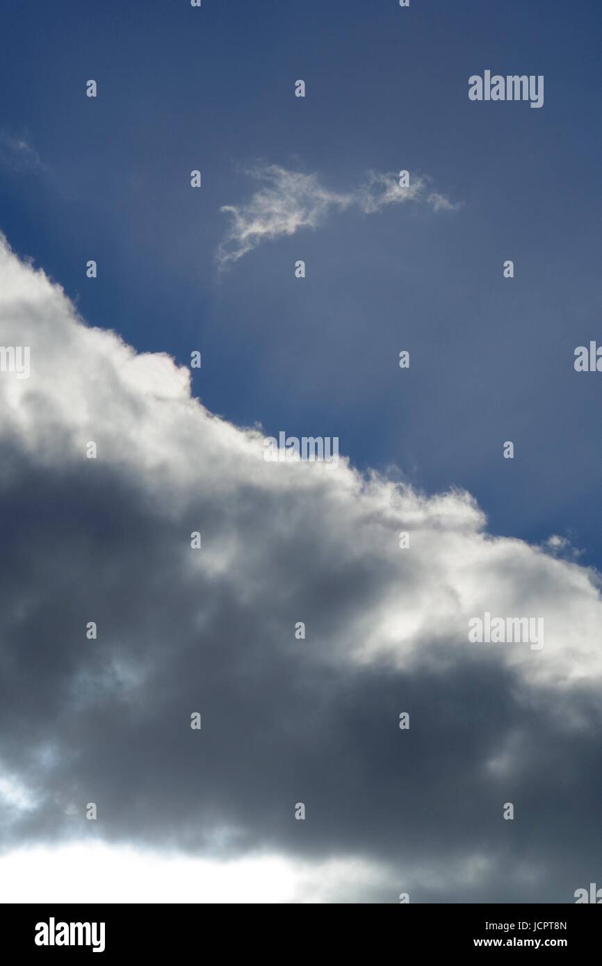 Illuminated Cumulus Clouds and Sun Rays.Exeter, Devon, UK. June, 2017 ...
