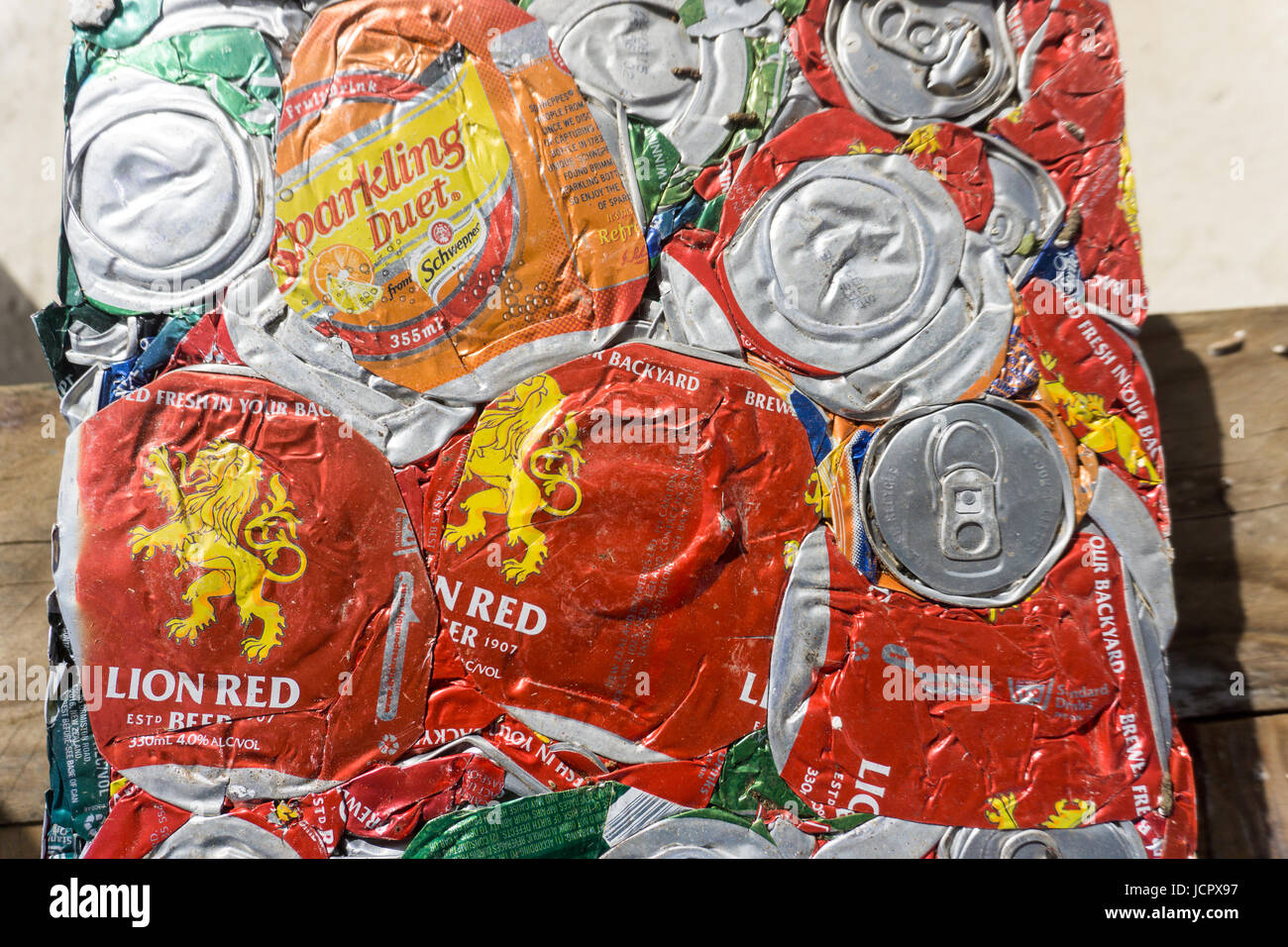 Compressed aluminium drink cans with branding showing ready for ...