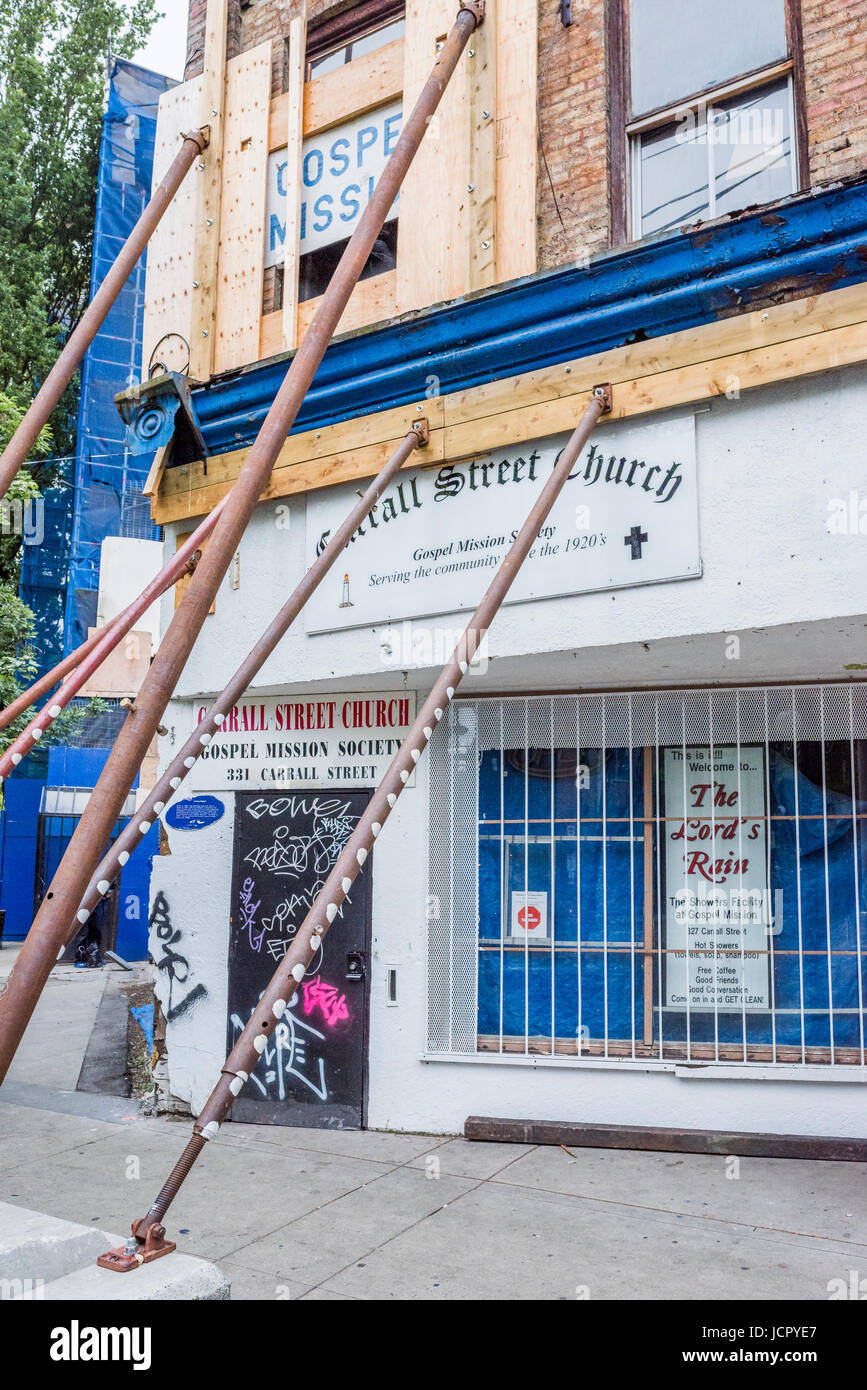 Building being propped uop by metal braces, Vancouver, British Columbia ...