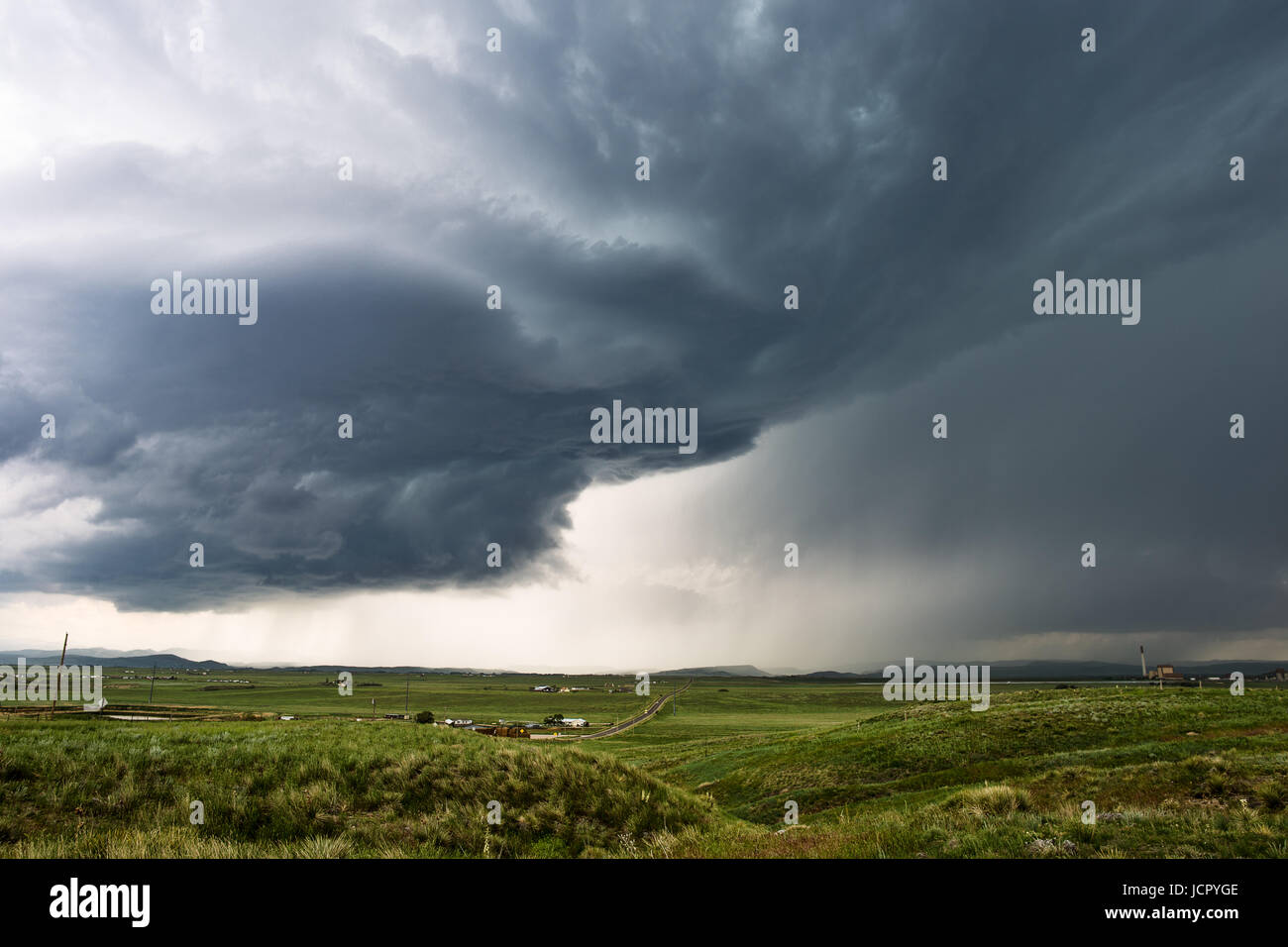 A supercell thunderstorm over a field in the Colorado plains near ...