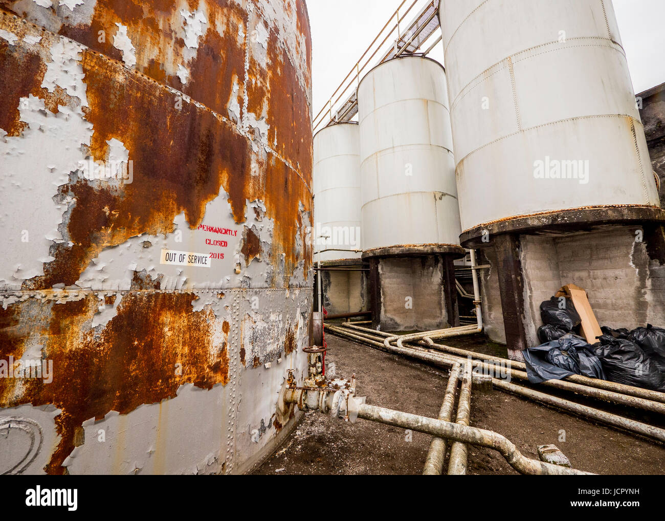 Chemical,oil and gasoline tank farm demolition Stock Photo - Alamy