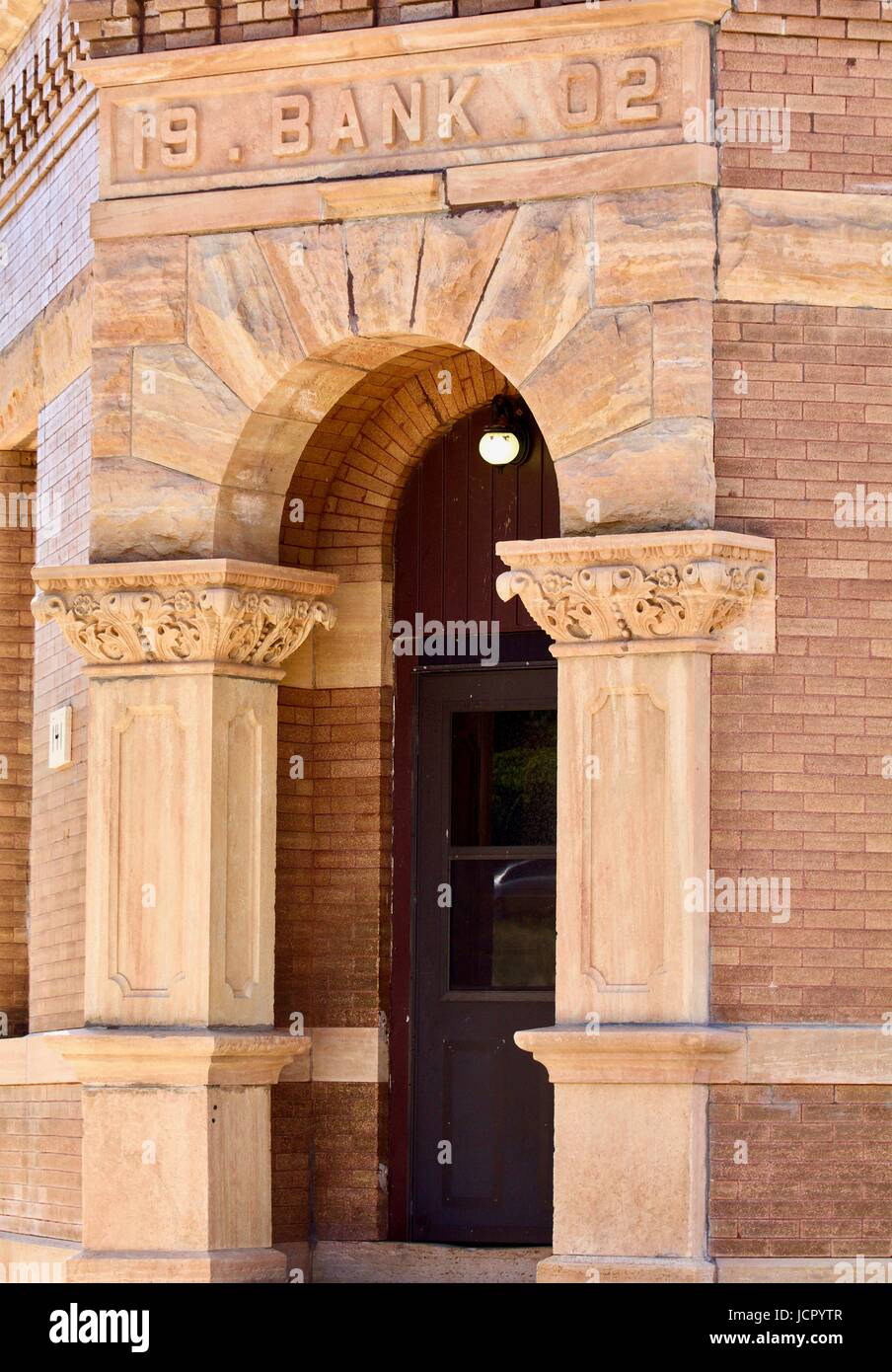 Entrance to old bank building Stock Photo - Alamy