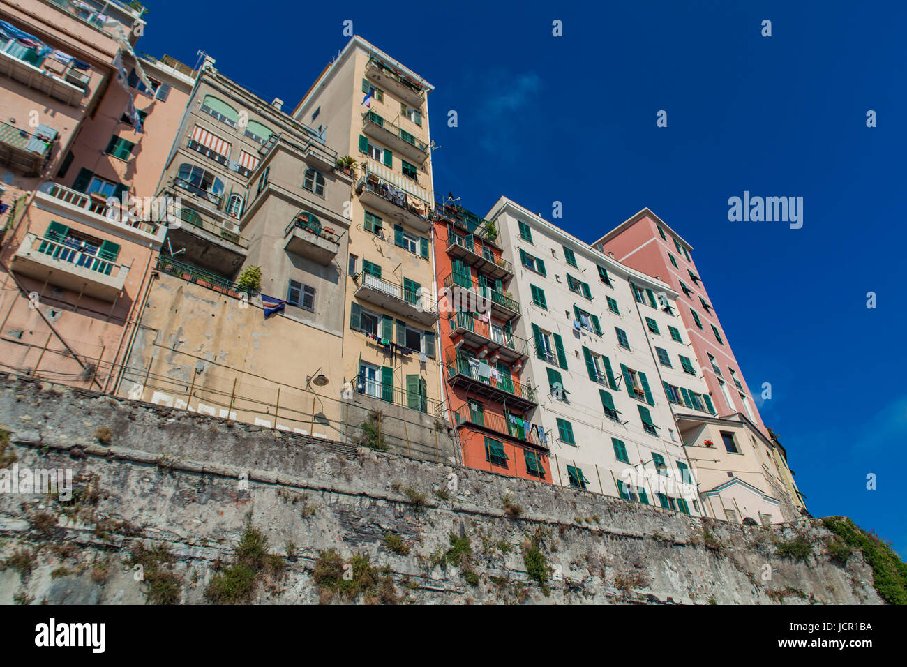 View at residential buildings in Genoa, Italy Stock Photo - Alamy