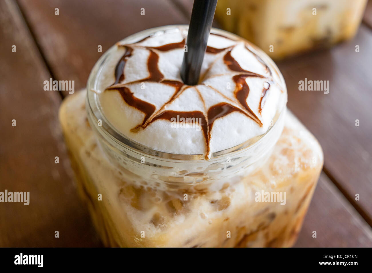 iced coffee mocha on table wood background in cafe Stock Photo - Alamy