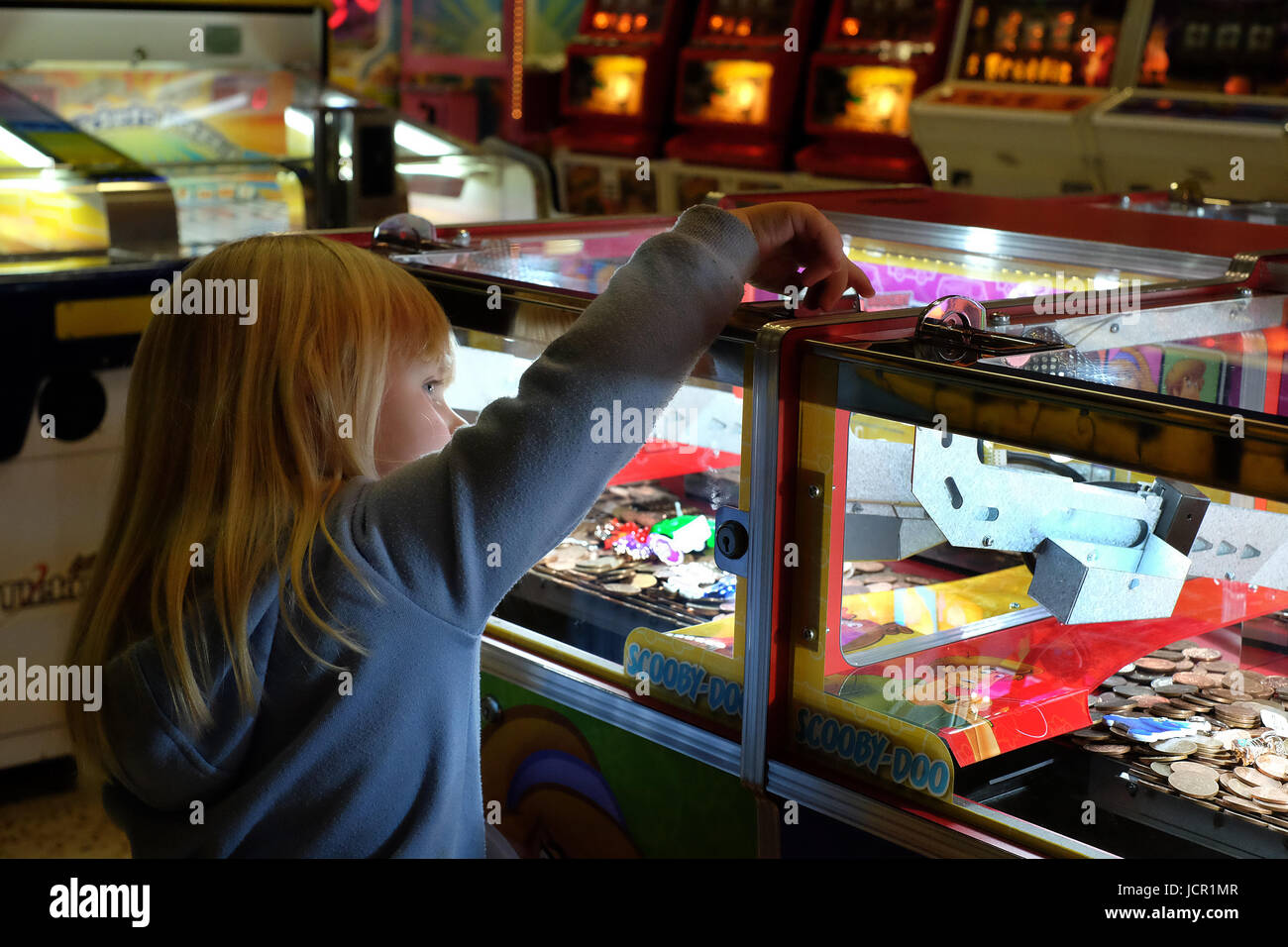 Children in amusement arcade hi-res stock photography and images - Alamy