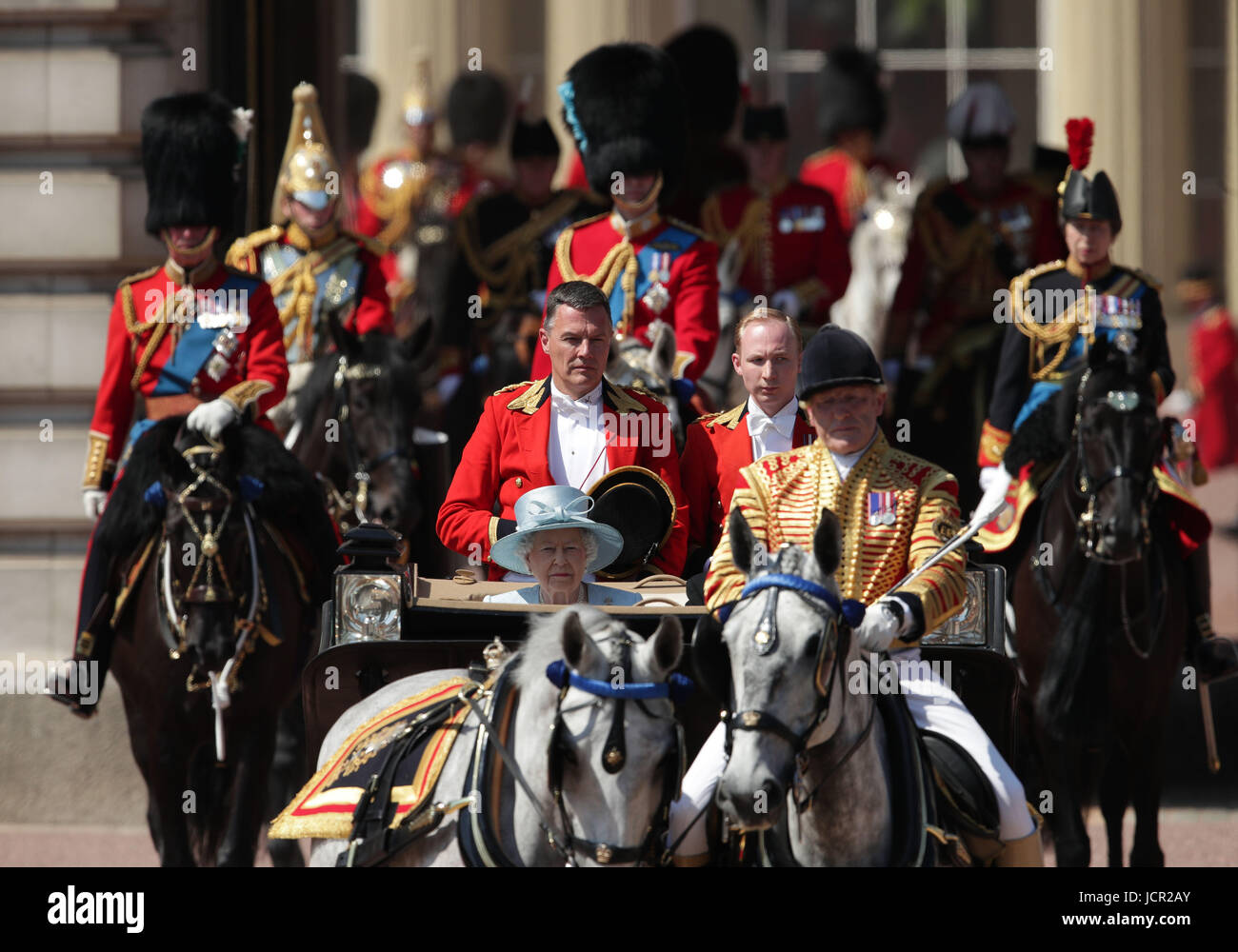 Queen Elizabeth II makes her way down The Mall from Buckingham Palace ...